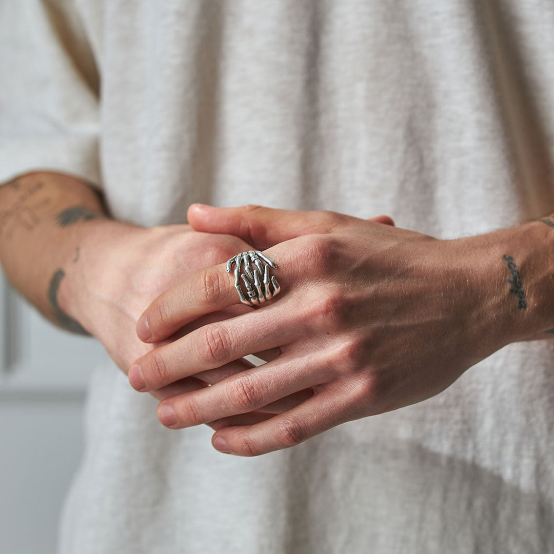 Silver Skeleton Hands Ring – SergeDeNimes US
